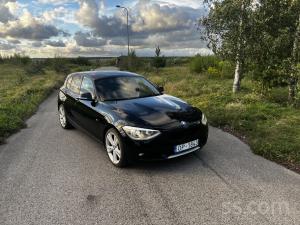 Black BMW 120 2012 in Riga, with an engine capacity of 2.00 L and mileage of 279 thousand km for 8200 €, photo  on AUTOMOTO.COM.LV