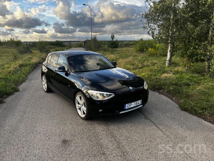 Black BMW 120 2012 in Riga, with an engine capacity of 2.00 L and mileage of 279 thousand km for 8200 €, photo 1 on AUTOMOTO.COM.LV