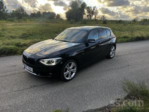 Black BMW 120 2012 in Riga, with an engine capacity of 2.00 L and mileage of 279 thousand km for 8200 €, photo 4 on AUTOMOTO.COM.LV