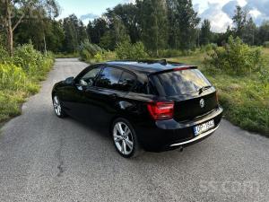 Black BMW 120 2012 in Riga, with an engine capacity of 2.00 L and mileage of 279 thousand km for 8200 €, photo 5 on AUTOMOTO.COM.LV