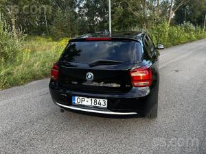 Black BMW 120 2012 in Riga, with an engine capacity of 2.00 L and mileage of 279 thousand km for 8200 €, photo 6 on AUTOMOTO.COM.LV