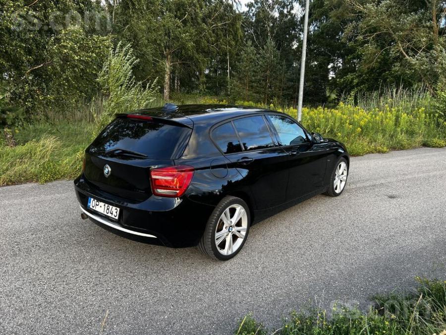 Black BMW 120 2012 in Riga, with an engine capacity of 2.00 L and mileage of 279 thousand km for 8200 €, photo 7 on AUTOMOTO.COM.LV