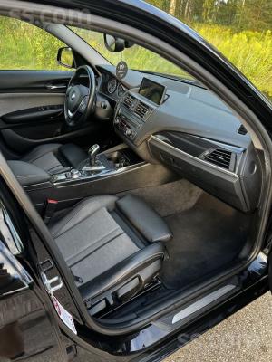 Black BMW 120 2012 in Riga, with an engine capacity of 2.00 L and mileage of 279 thousand km for 8200 €, photo 8 on AUTOMOTO.COM.LV