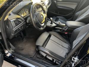 Black BMW 120 2012 in Riga, with an engine capacity of 2.00 L and mileage of 279 thousand km for 8200 €, photo 9 on AUTOMOTO.COM.LV