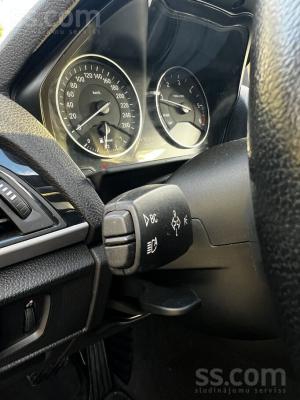 Black BMW 120 2012 in Riga, with an engine capacity of 2.00 L and mileage of 279 thousand km for 8200 €, photo 12 on AUTOMOTO.COM.LV