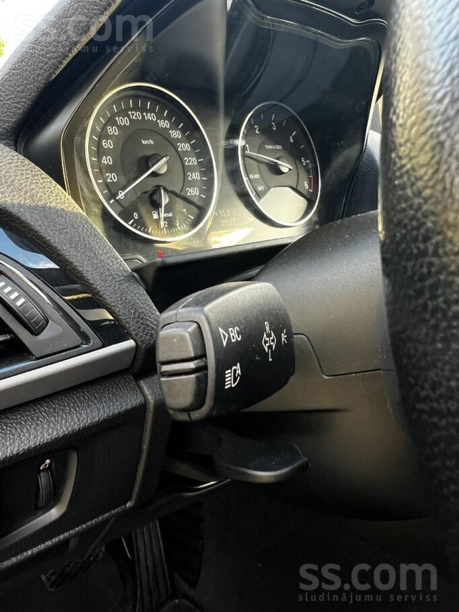 Black BMW 120 2012 in Riga, with an engine capacity of 2.00 L and mileage of 279 thousand km for 8200 €, photo 12 on AUTOMOTO.COM.LV