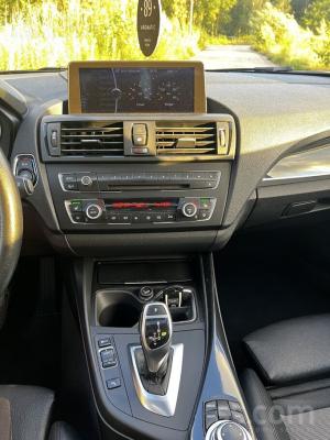 Black BMW 120 2012 in Riga, with an engine capacity of 2.00 L and mileage of 279 thousand km for 8200 €, photo 16 on AUTOMOTO.COM.LV