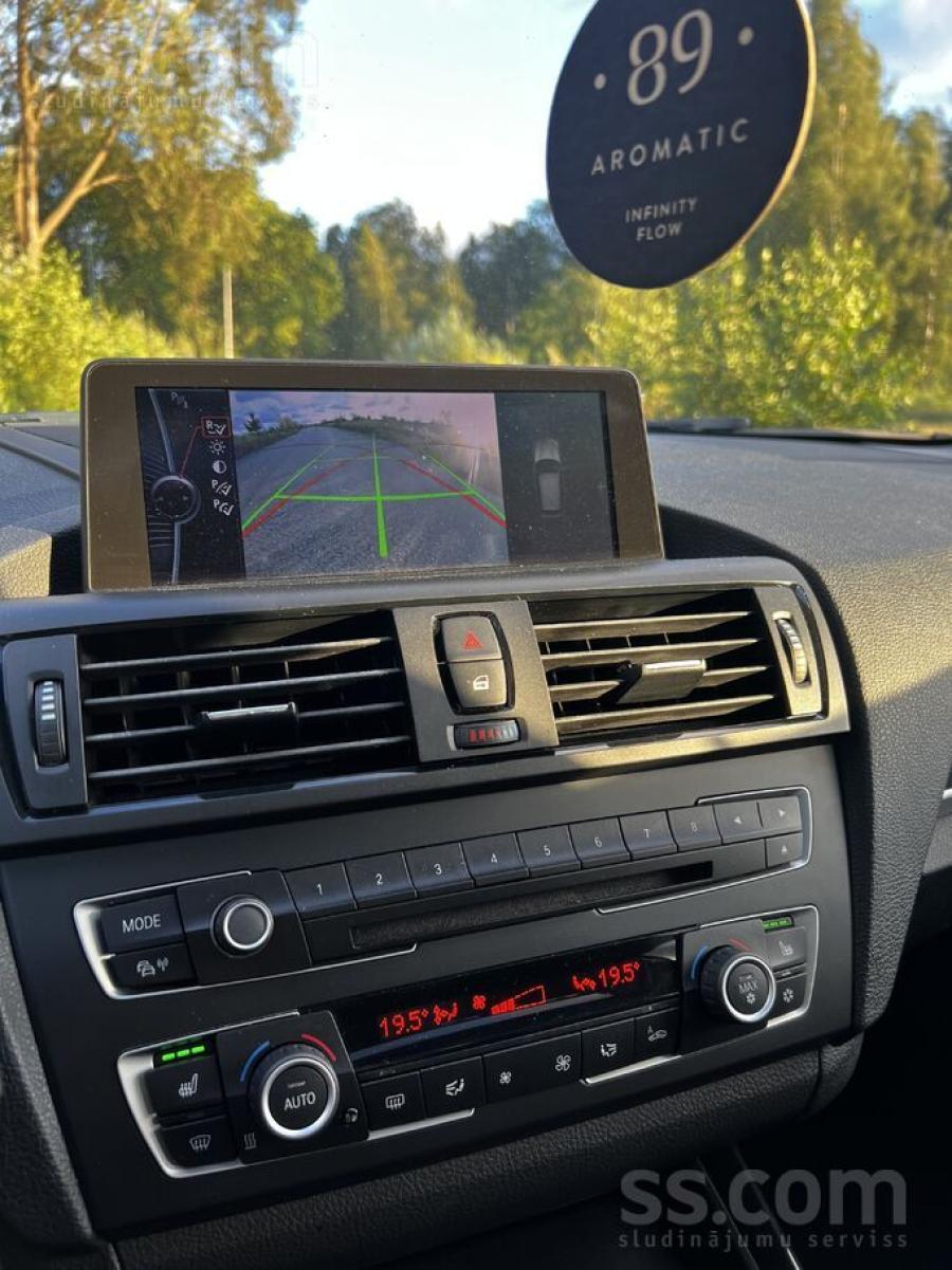 Black BMW 120 2012 in Riga, with an engine capacity of 2.00 L and mileage of 279 thousand km for 8200 €, photo 17 on AUTOMOTO.COM.LV
