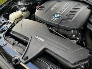 Black BMW 120 2012 in Riga, with an engine capacity of 2.00 L and mileage of 279 thousand km for 8200 €, photo 19 on AUTOMOTO.COM.LV