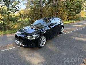 Black BMW 120 2012 in Riga, with an engine capacity of 2.00 L and mileage of 279 thousand km for 9500 €, photo 1 on AUTOMOTO.COM.LV