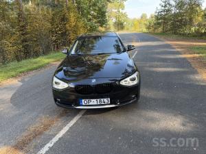 Black BMW 120 2012 in Riga, with an engine capacity of 2.00 L and mileage of 279 thousand km for 9500 €, photo 3 on AUTOMOTO.COM.LV