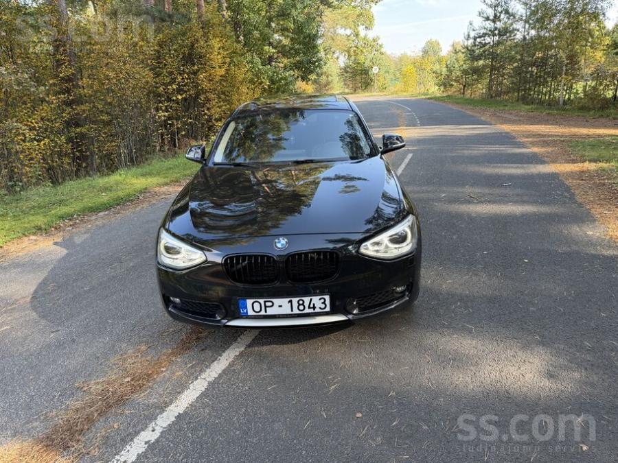 Black BMW 120 2012 in Riga, with an engine capacity of 2.00 L and mileage of 279 thousand km for 9500 €, photo 3 on AUTOMOTO.COM.LV