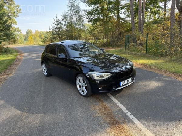 Black BMW 120 2012 in Riga, with an engine capacity of 2.00 L and mileage of 279 thousand km for 9500 €, photo 4 on AUTOMOTO.COM.LV