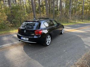 Black BMW 120 2012 in Riga, with an engine capacity of 2.00 L and mileage of 279 thousand km for 9500 €, photo 5 on AUTOMOTO.COM.LV