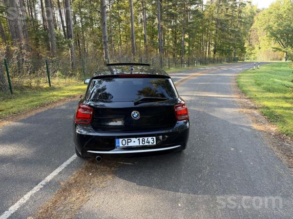 Black BMW 120 2012 in Riga, with an engine capacity of 2.00 L and mileage of 279 thousand km for 9500 €, photo 6 on AUTOMOTO.COM.LV