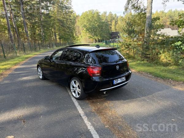 Black BMW 120 2012 in Riga, with an engine capacity of 2.00 L and mileage of 279 thousand km for 9500 €, photo 7 on AUTOMOTO.COM.LV