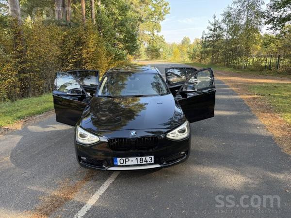 Black BMW 120 2012 in Riga, with an engine capacity of 2.00 L and mileage of 279 thousand km for 9500 €, photo 8 on AUTOMOTO.COM.LV