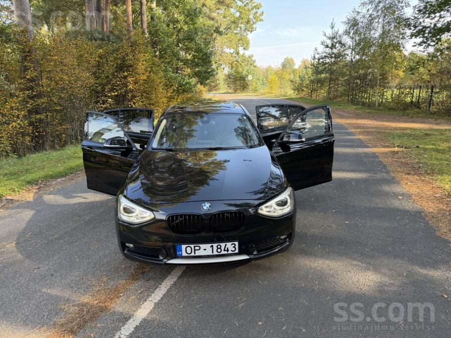 Black BMW 120 2012 in Riga, with an engine capacity of 2.00 L and mileage of 279 thousand km for 9500 €, photo 8 on AUTOMOTO.COM.LV