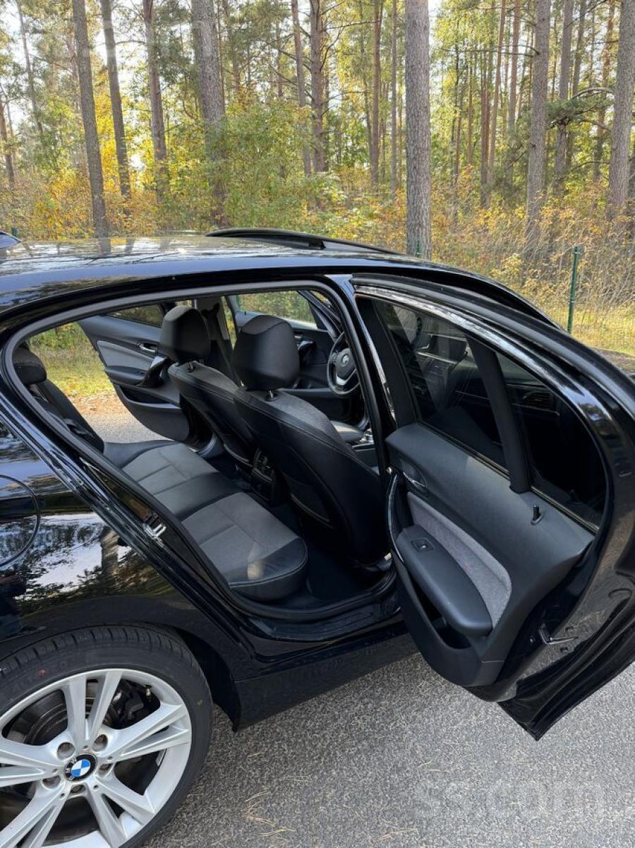 Black BMW 120 2012 in Riga, with an engine capacity of 2.00 L and mileage of 279 thousand km for 9500 €, photo 10 on AUTOMOTO.COM.LV