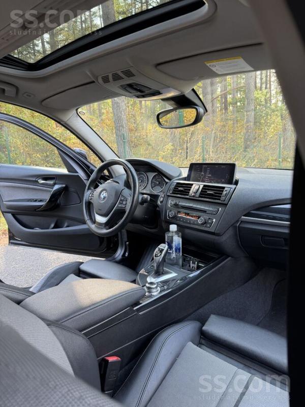 Black BMW 120 2012 in Riga, with an engine capacity of 2.00 L and mileage of 279 thousand km for 9500 €, photo 11 on AUTOMOTO.COM.LV