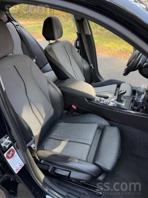 Black BMW 120 2012 in Riga, with an engine capacity of 2.00 L and mileage of 279 thousand km for 9500 €, photo 12 on AUTOMOTO.COM.LV