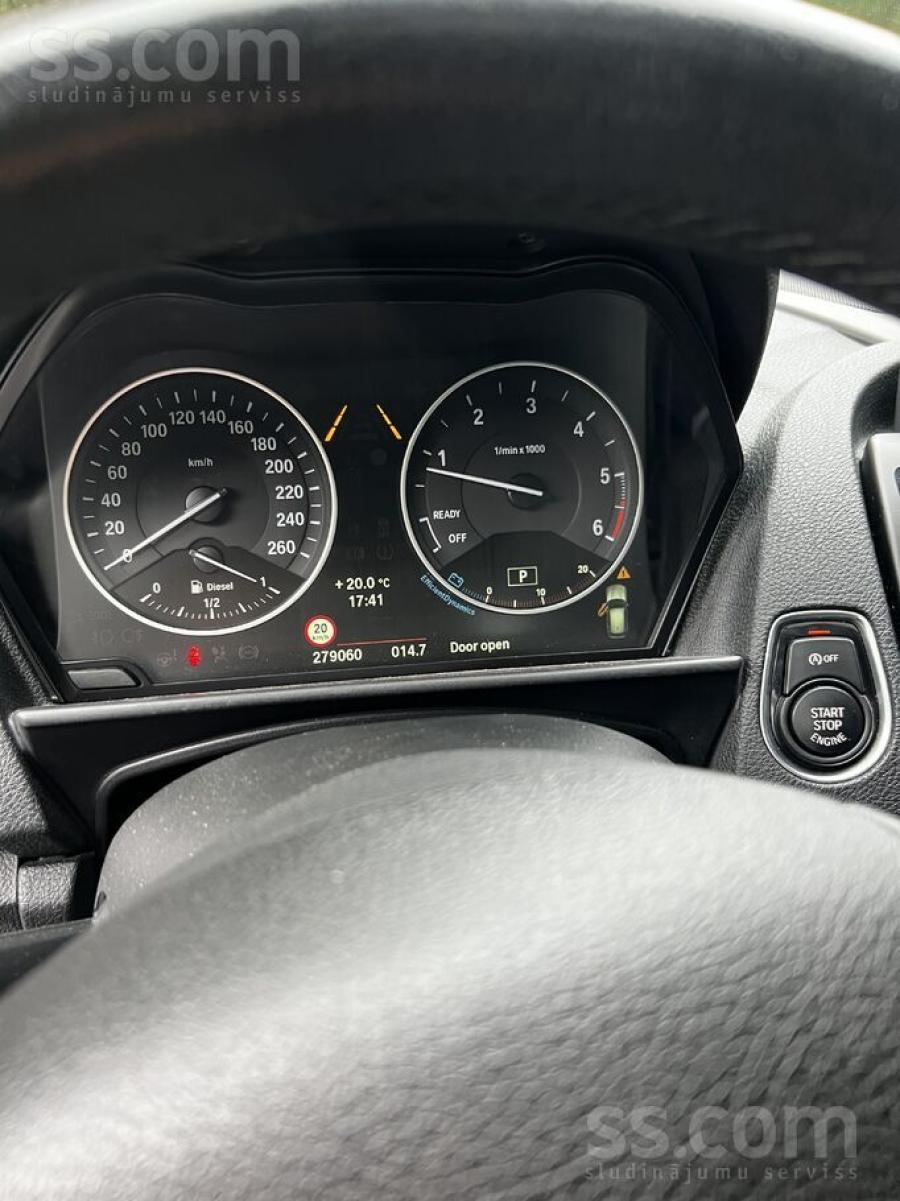 Black BMW 120 2012 in Riga, with an engine capacity of 2.00 L and mileage of 279 thousand km for 9500 €, photo 13 on AUTOMOTO.COM.LV