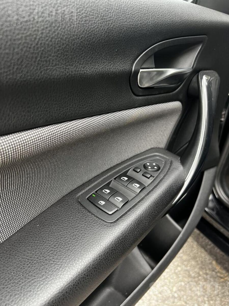 Black BMW 120 2012 in Riga, with an engine capacity of 2.00 L and mileage of 279 thousand km for 9500 €, photo 15 on AUTOMOTO.COM.LV
