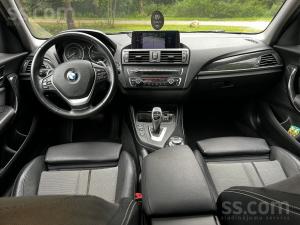 Black BMW 120 2012 in Riga, with an engine capacity of 2.00 L and mileage of 279 thousand km for 9500 €, photo 16 on AUTOMOTO.COM.LV