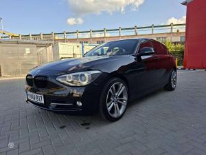 Black BMW 120 2012 in Vilnius, with an engine capacity of 2.00 L and mileage of 291 thousand km for 7800 €, photo  on AUTOMOTO.COM.LV