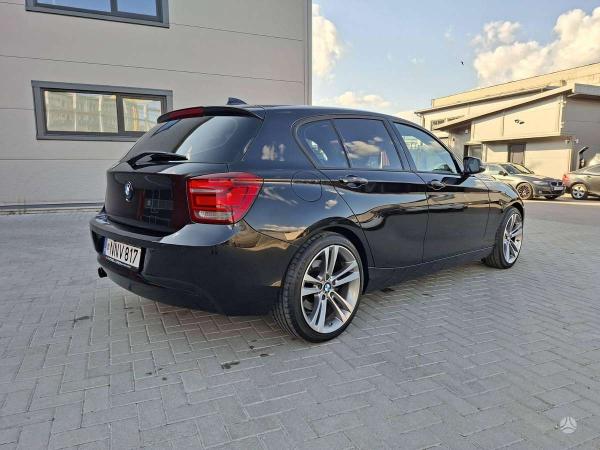 Black BMW 120 2012 in Vilnius, with an engine capacity of 2.00 L and mileage of 291 thousand km for 7800 €, photo 4 on AUTOMOTO.COM.LV