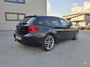 Black BMW 120 2012 in Vilnius, with an engine capacity of 2.00 L and mileage of 291 thousand km for 7800 €, photo 5 on AUTOMOTO.COM.LV