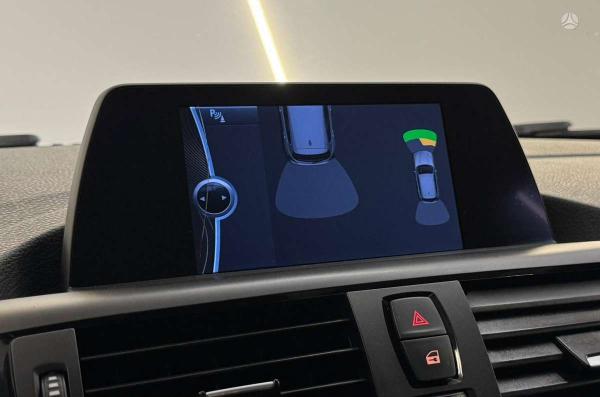 Black BMW 120 2012 in Marijampole, with an engine capacity of 2.00 L and mileage of 192 thousand km for 6900 €, photo 6 on AUTOMOTO.COM.LV