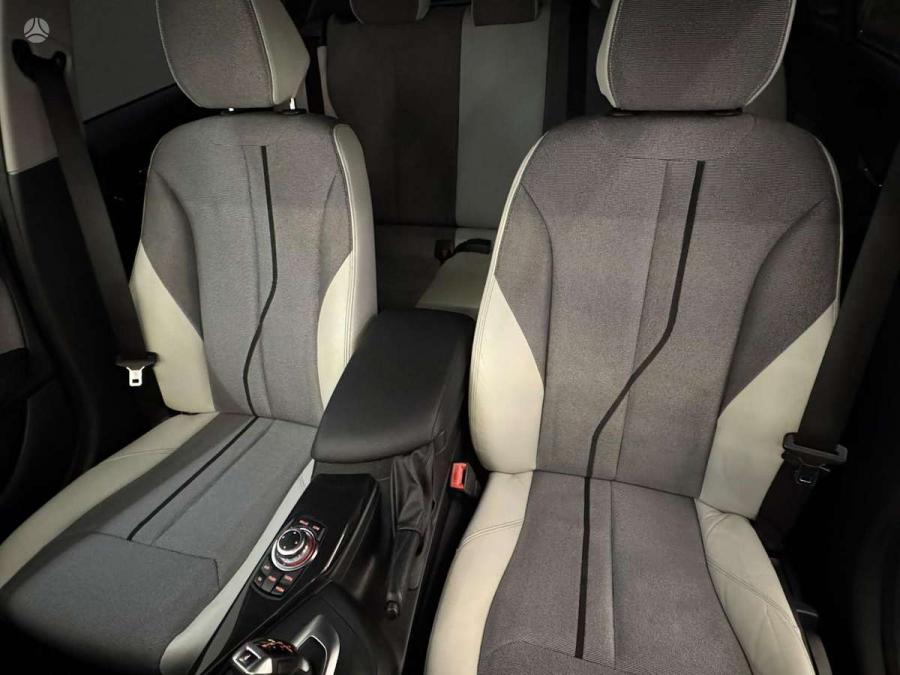 Black BMW 120 2012 in Marijampole, with an engine capacity of 2.00 L and mileage of 192 thousand km for 6900 €, photo 12 on AUTOMOTO.COM.LV