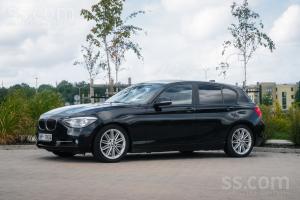 Black BMW 120 2012 in Riga, with an engine capacity of 2.00 L and mileage of 268 thousand km for 6690 €, photo 4 on AUTOMOTO.COM.LV