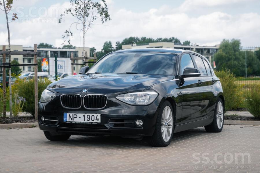 Black BMW 120 2012 in Riga, with an engine capacity of 2.00 L and mileage of 268 thousand km for 6690 €, photo 5 on AUTOMOTO.COM.LV