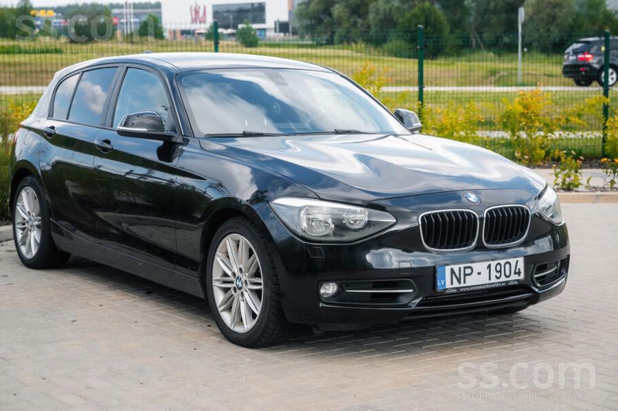 Black BMW 120 2012 in Riga, with an engine capacity of 2.00 L and mileage of 268 thousand km for 6690 €, photo 6 on AUTOMOTO.COM.LV