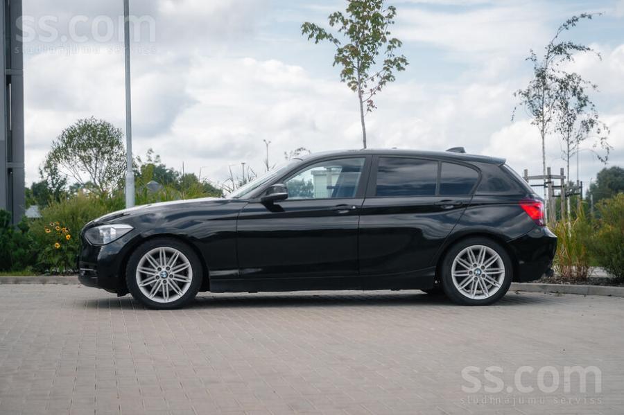 Black BMW 120 2012 in Riga, with an engine capacity of 2.00 L and mileage of 268 thousand km for 6690 €, photo 7 on AUTOMOTO.COM.LV