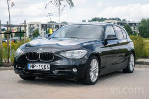 Black BMW 120 2012 in Riga, with an engine capacity of 2.00 L and mileage of 268 thousand km for 6690 €, photo 8 on AUTOMOTO.COM.LV