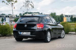 Black BMW 120 2012 in Riga, with an engine capacity of 2.00 L and mileage of 268 thousand km for 6690 €, photo 10 on AUTOMOTO.COM.LV