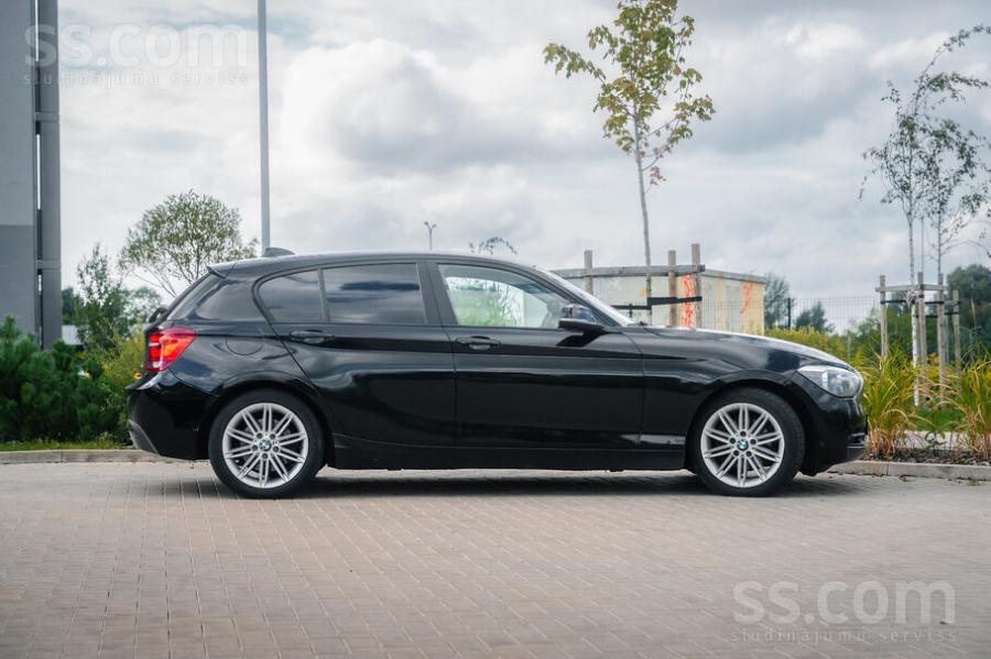 Black BMW 120 2012 in Riga, with an engine capacity of 2.00 L and mileage of 268 thousand km for 6690 €, photo 12 on AUTOMOTO.COM.LV