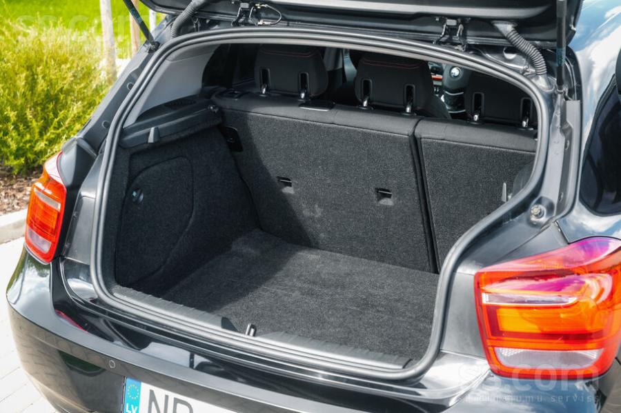 Black BMW 120 2012 in Riga, with an engine capacity of 2.00 L and mileage of 268 thousand km for 6690 €, photo 13 on AUTOMOTO.COM.LV