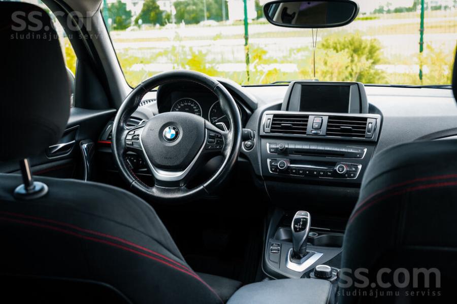 Black BMW 120 2012 in Riga, with an engine capacity of 2.00 L and mileage of 268 thousand km for 6690 €, photo 14 on AUTOMOTO.COM.LV