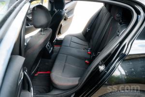 Black BMW 120 2012 in Riga, with an engine capacity of 2.00 L and mileage of 268 thousand km for 6690 €, photo 16 on AUTOMOTO.COM.LV