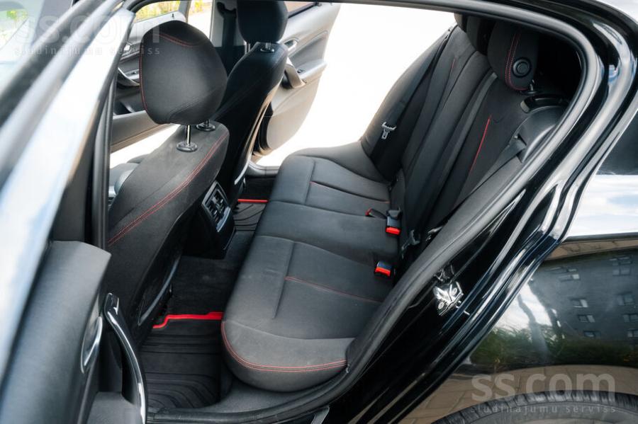 Black BMW 120 2012 in Riga, with an engine capacity of 2.00 L and mileage of 268 thousand km for 6690 €, photo 16 on AUTOMOTO.COM.LV