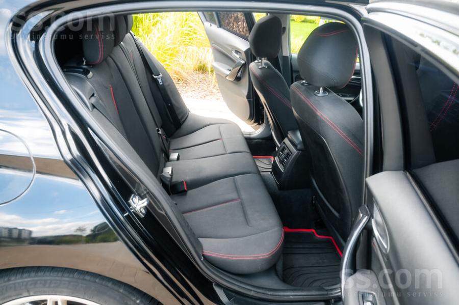 Black BMW 120 2012 in Riga, with an engine capacity of 2.00 L and mileage of 268 thousand km for 6690 €, photo 17 on AUTOMOTO.COM.LV