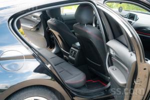 Black BMW 120 2012 in Riga, with an engine capacity of 2.00 L and mileage of 268 thousand km for 6690 €, photo 18 on AUTOMOTO.COM.LV