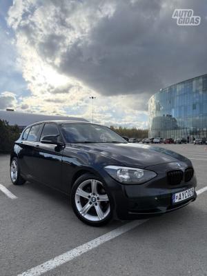 Black BMW 120 2013 in Siauliai, with an engine capacity of 2.00 L and mileage of 163 thousand km for 3999 €, photo  on AUTOMOTO.COM.LV