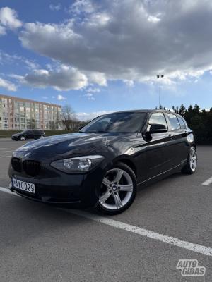 Black BMW 120 2013 in Siauliai, with an engine capacity of 2.00 L and mileage of 163 thousand km for 3999 €, photo 5 on AUTOMOTO.COM.LV