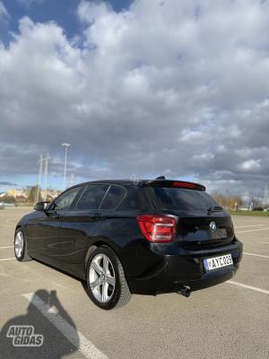 Black BMW 120 2013 in Siauliai, with an engine capacity of 2.00 L and mileage of 163 thousand km for 3999 €, photo 7 on AUTOMOTO.COM.LV