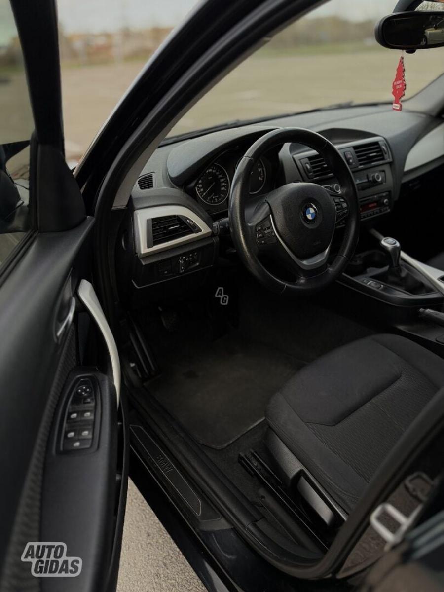 Black BMW 120 2013 in Siauliai, with an engine capacity of 2.00 L and mileage of 163 thousand km for 3999 €, photo 12 on AUTOMOTO.COM.LV